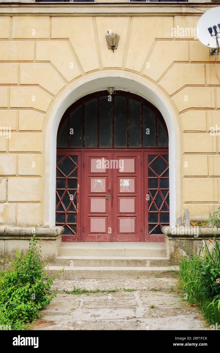 vintage door on the ancient facade. typical european architectural ...