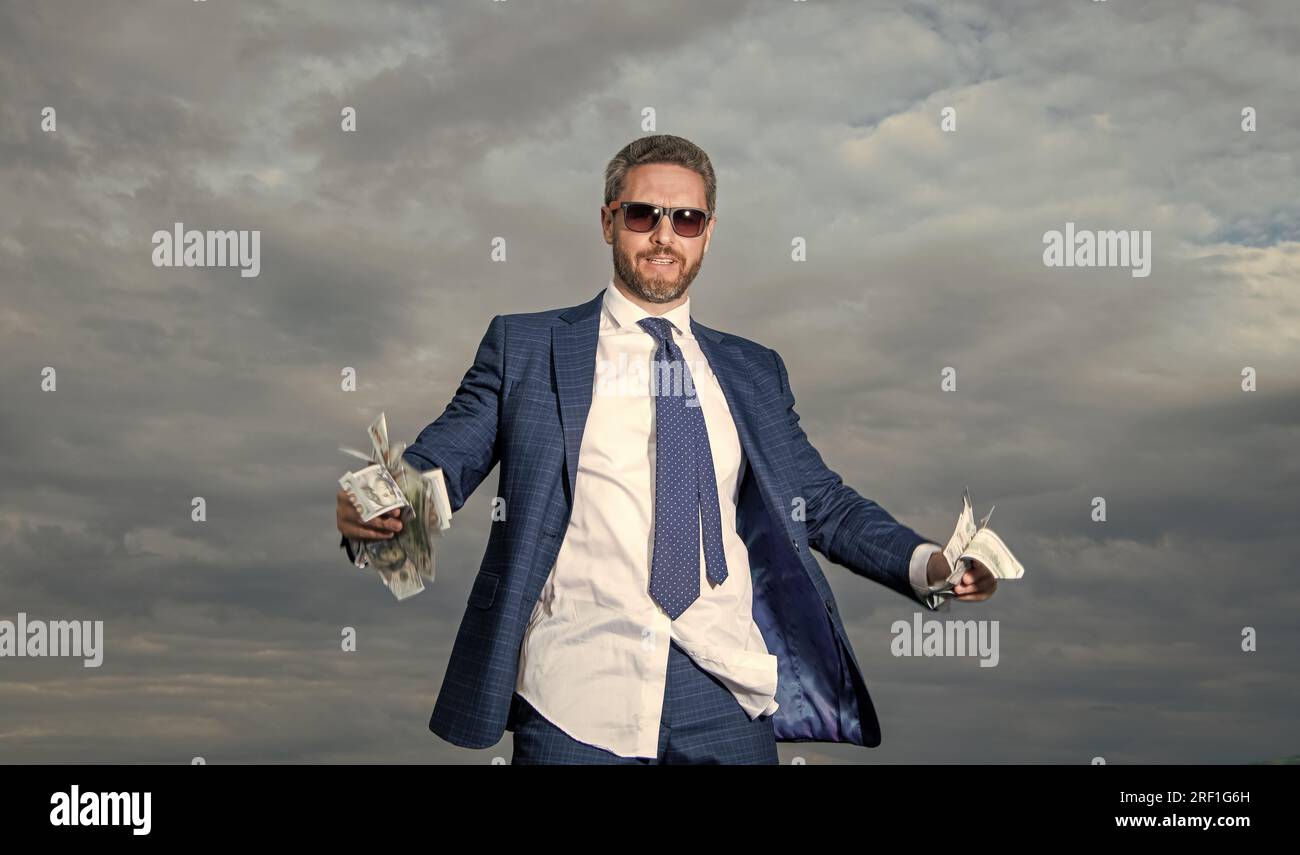 successful millionaire man with money in suit. photo of millionaire man ...
