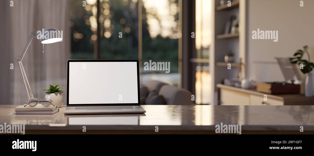 Close-up image of a modern home office with a laptop white screen ...