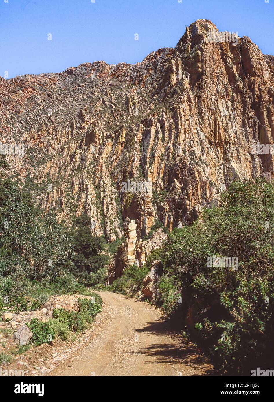 The Swartberg Pass runs over the Swartberg mountains along the edge of ...