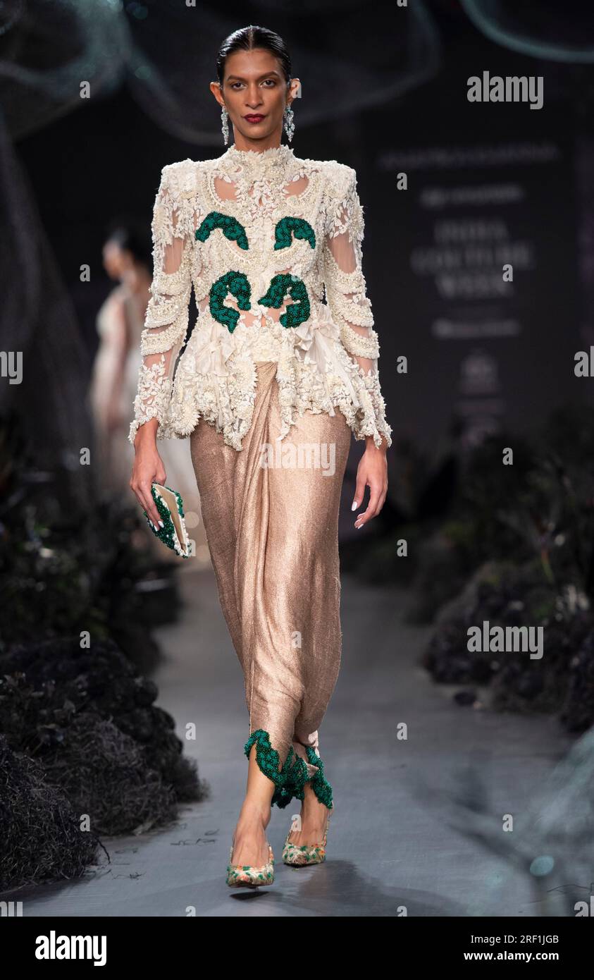 New Delhi, India. 30th July, 2023. A model displays a creation by ...