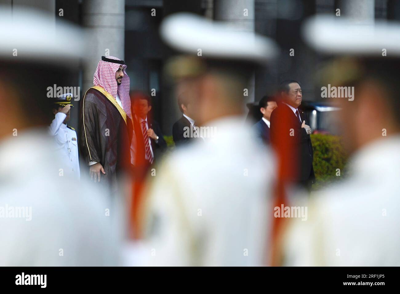 Saudi Arabia's Defense Minister Prince Khalid bin Salman, center left ...