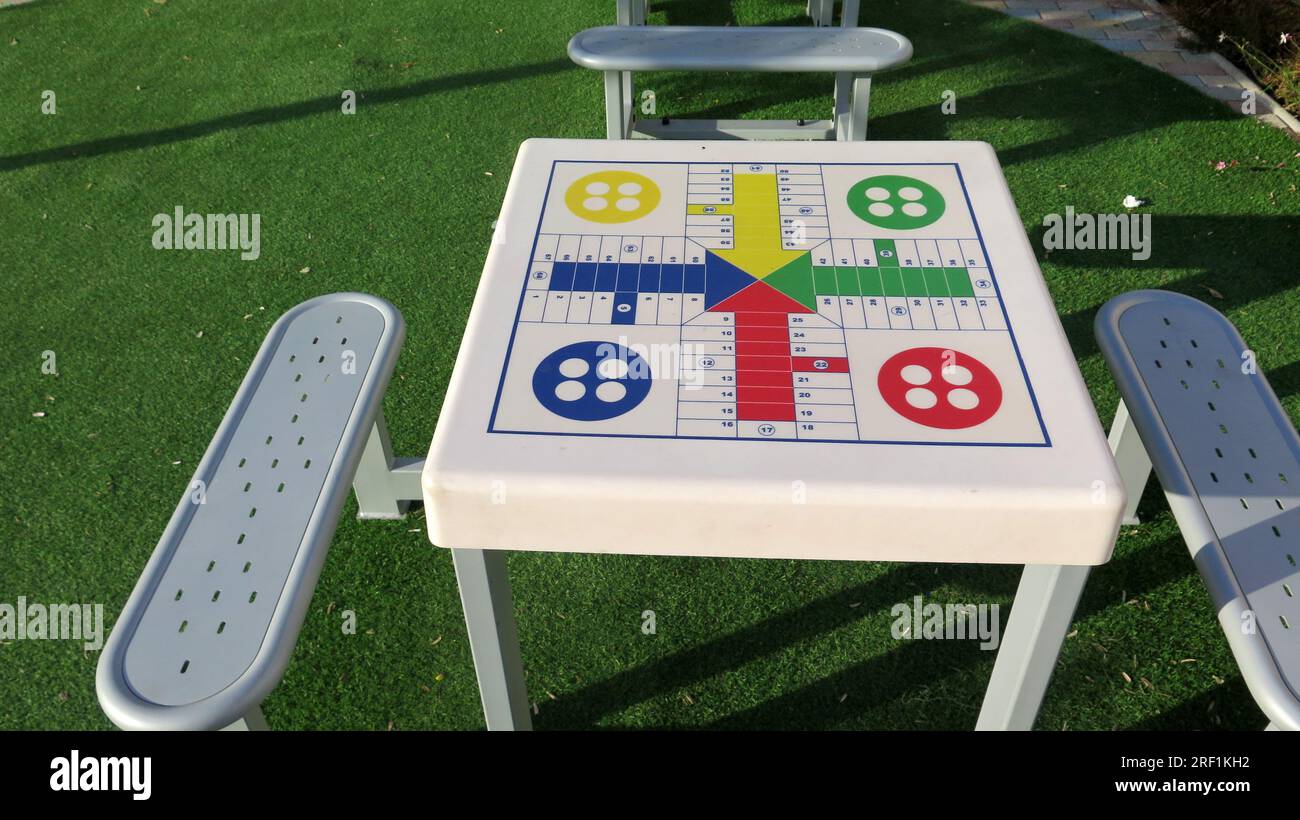 Games tables at children park in Andalusian village Stock Photo - Alamy
