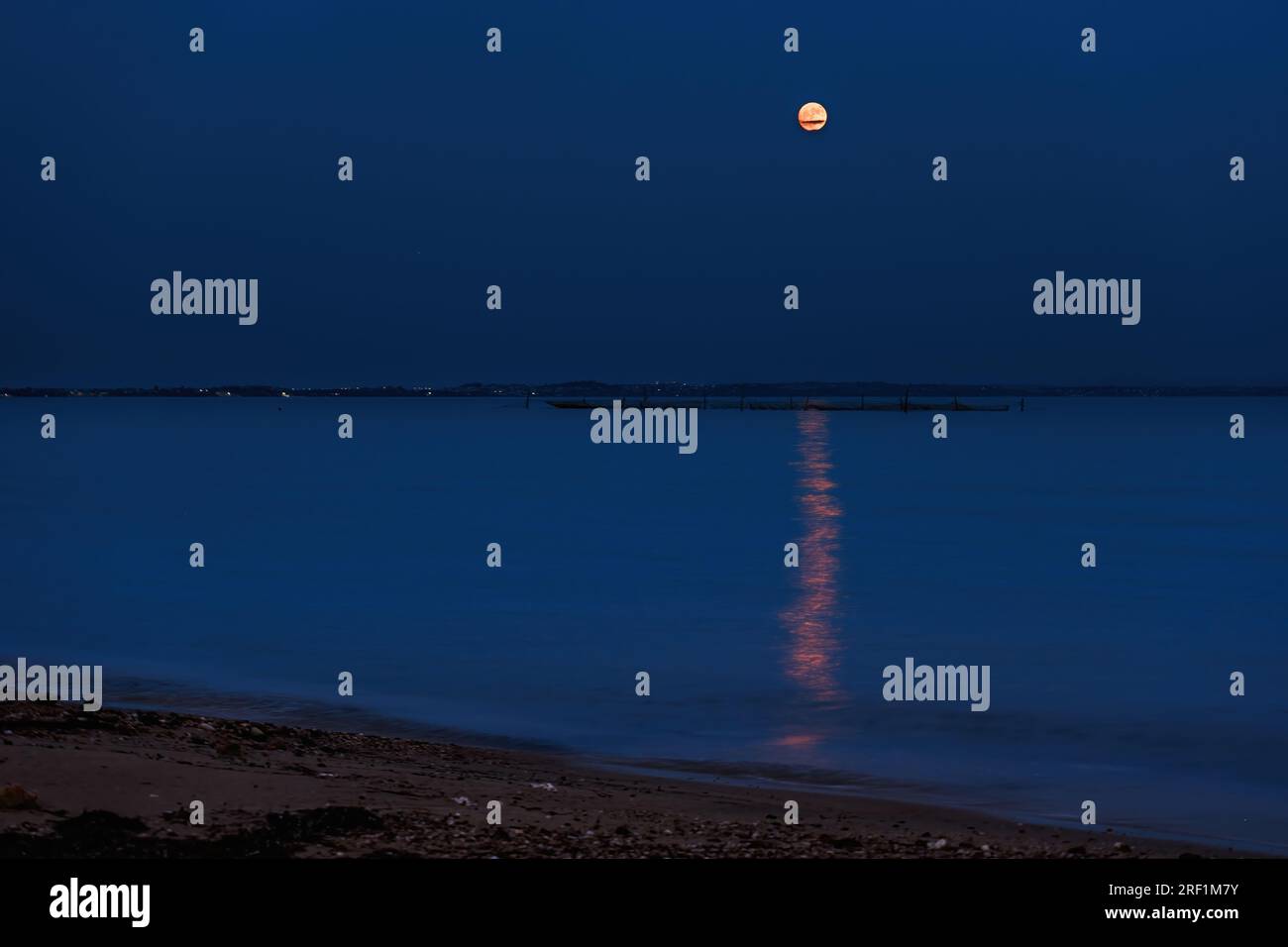 night seascape with full moon and moonlight on dark sky Stock Photo - Alamy
