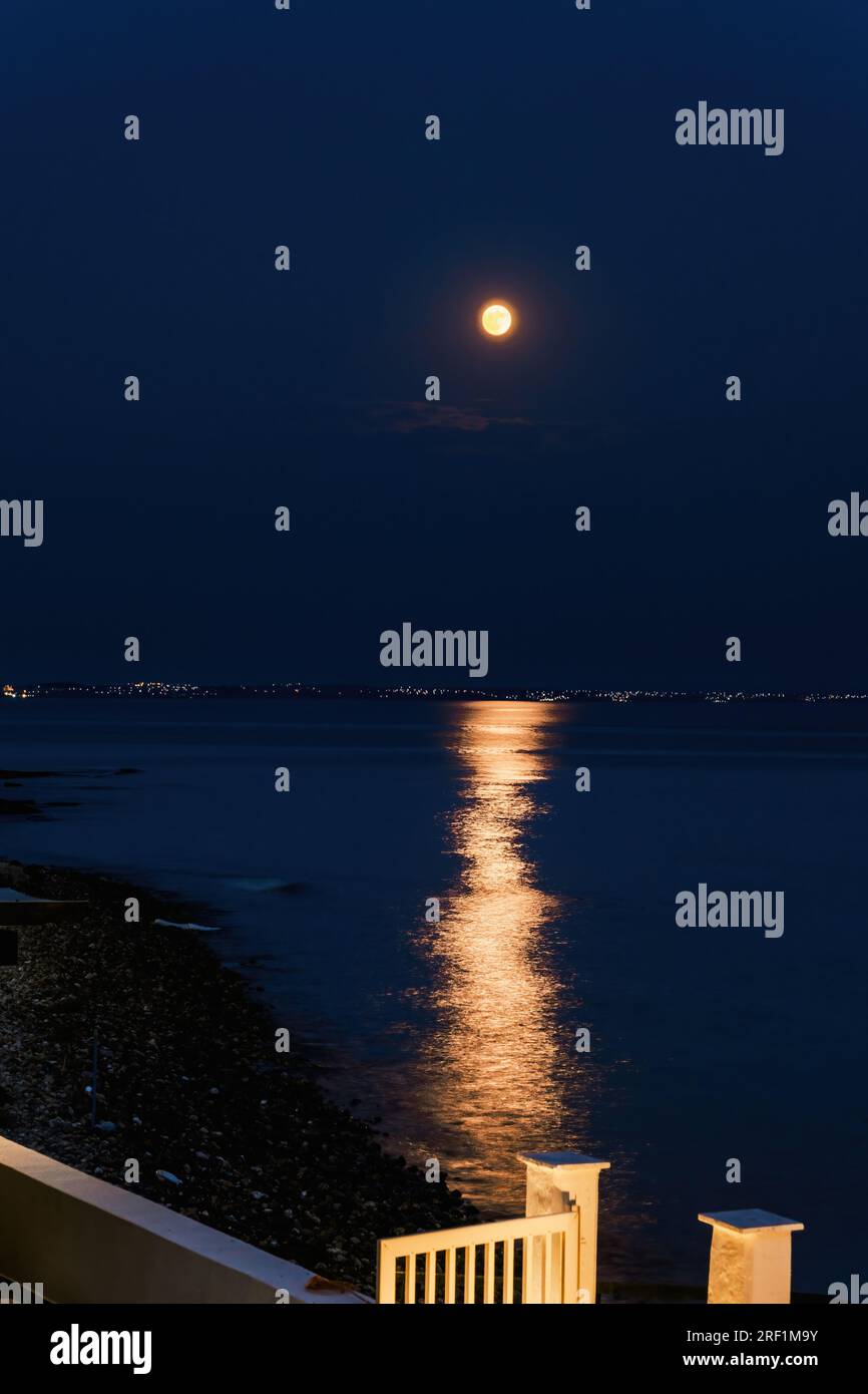 night seascape with full moon and moonlight on dark sky Stock Photo - Alamy