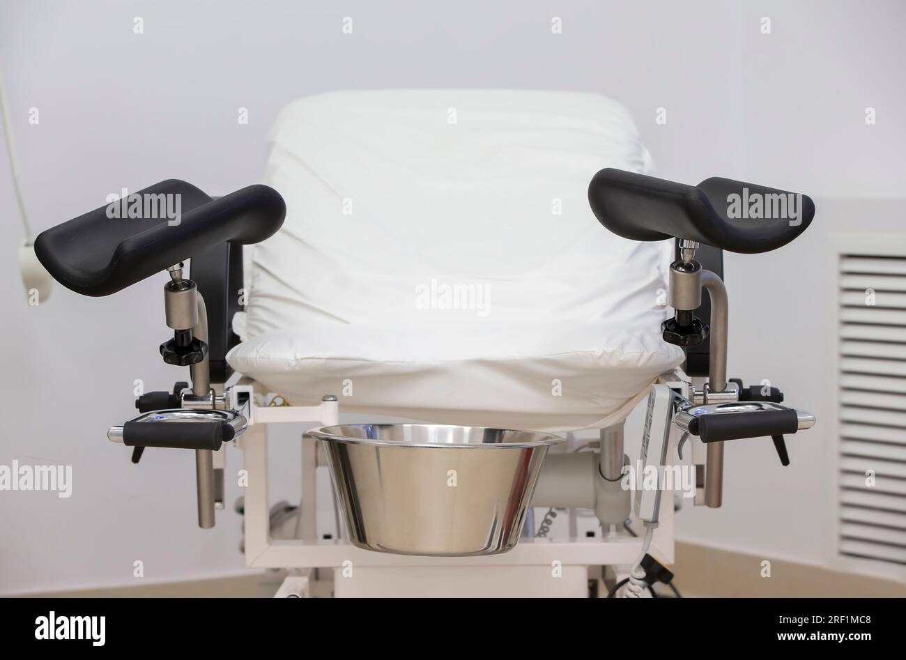 Gynecological chair close-up. Medical chair for urological and ...