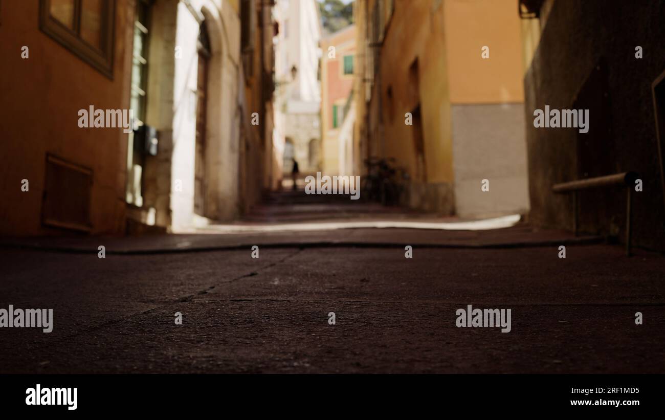 Close focus low angle background of Old city of Nice with vibrant walls ...