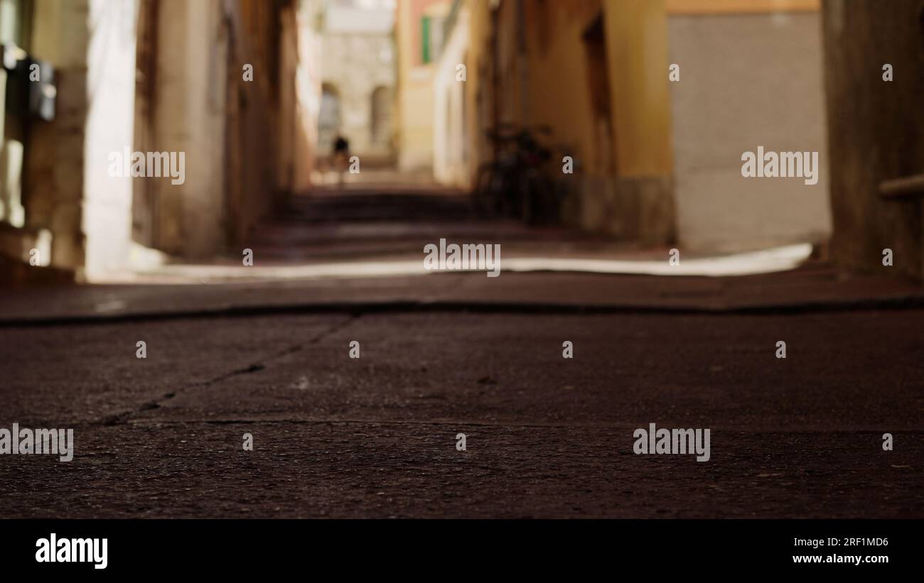 Close focus low angle background of Old city of Nice with vibrant walls ...