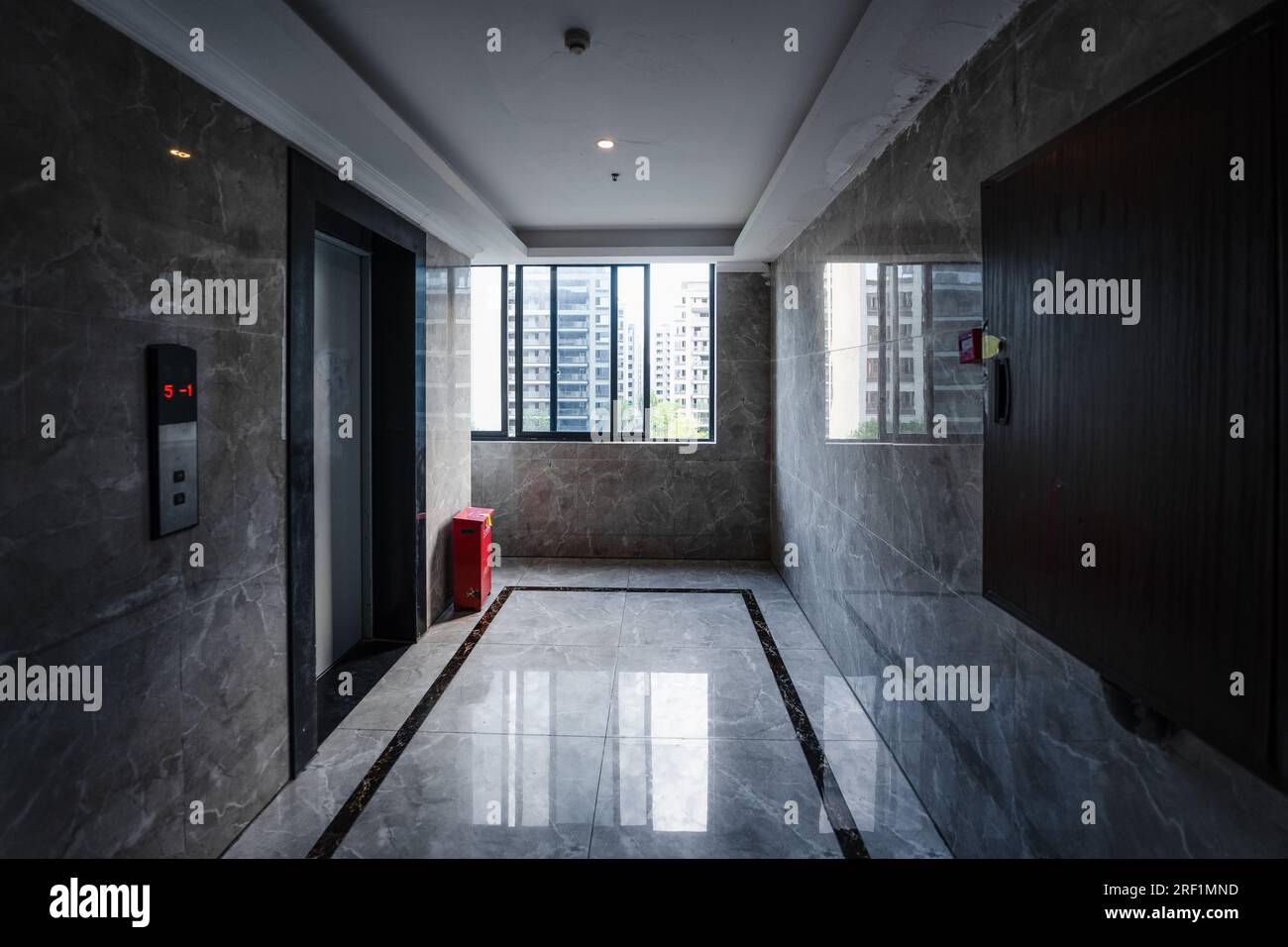 The sunny day interior of the apartment building hallway Stock Photo ...