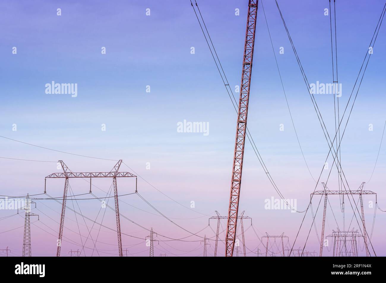Electricity pylons transmission towers with overhead power lines in ...