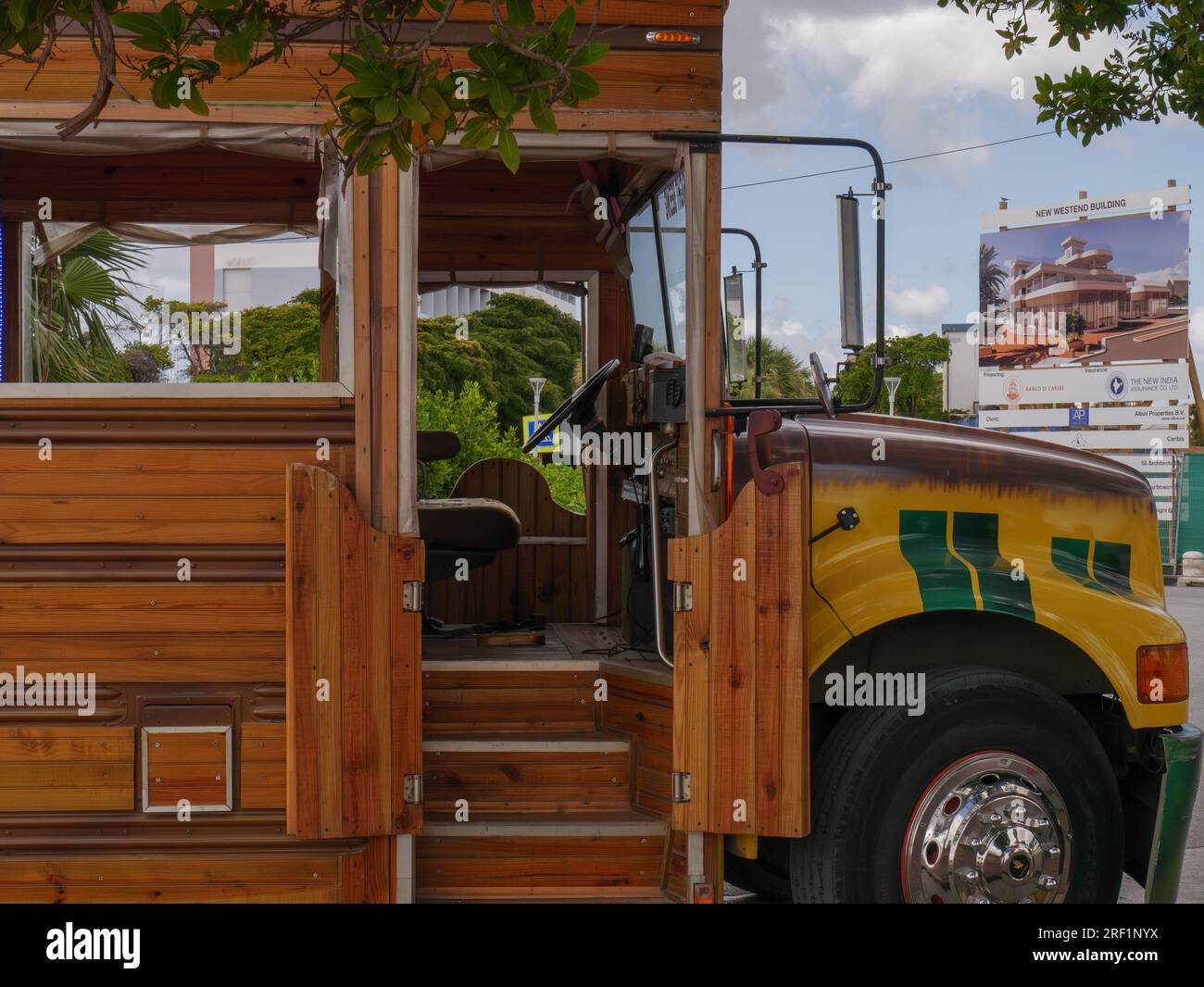 Entry view of a the woodwork and bright paintwork of a tourist bus on ...