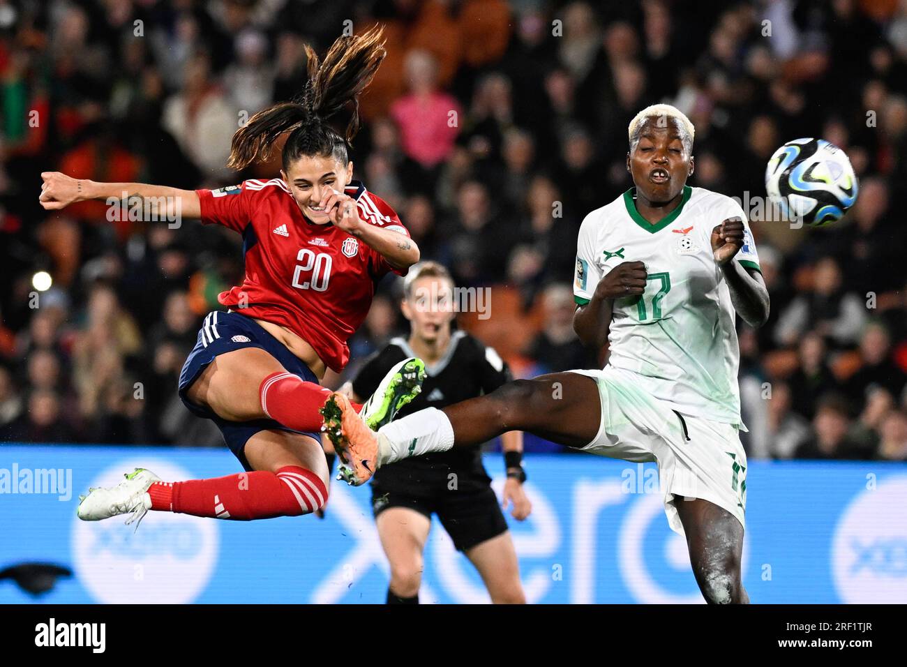 Costa Rica's Fabiola Villalobos, left, takes a shot at goal as Zambia's ...