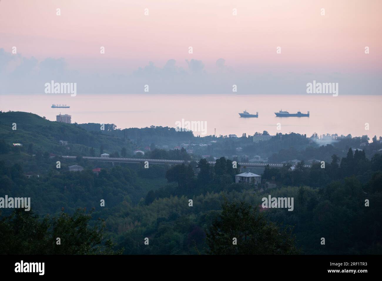 Beautiful tourist landscape of highlands by the sea in the distance ...