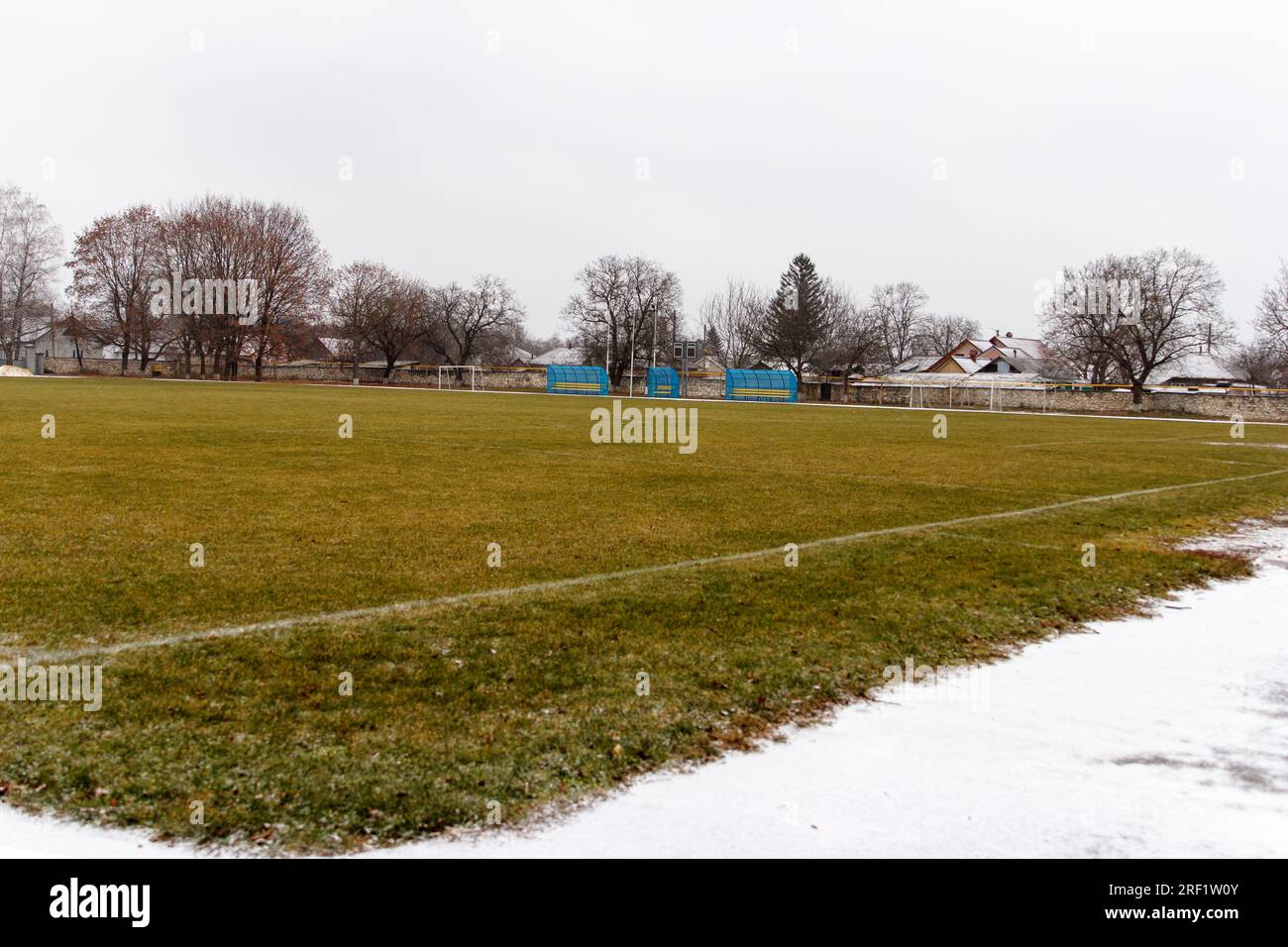 Review of sports stadium. A large football field covered with grass ...