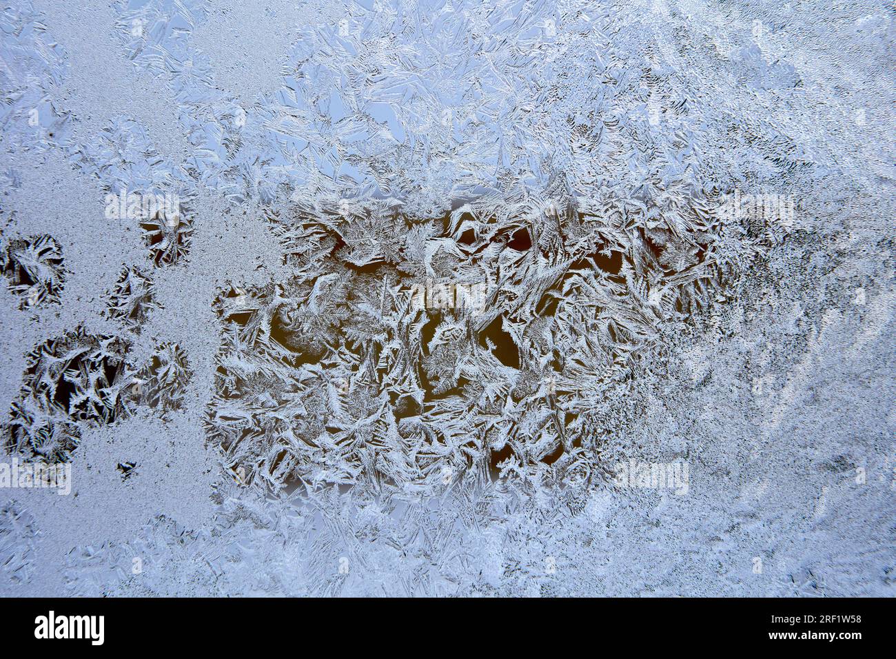 Frosty pattern on rimy winter window glass Stock Photo - Alamy