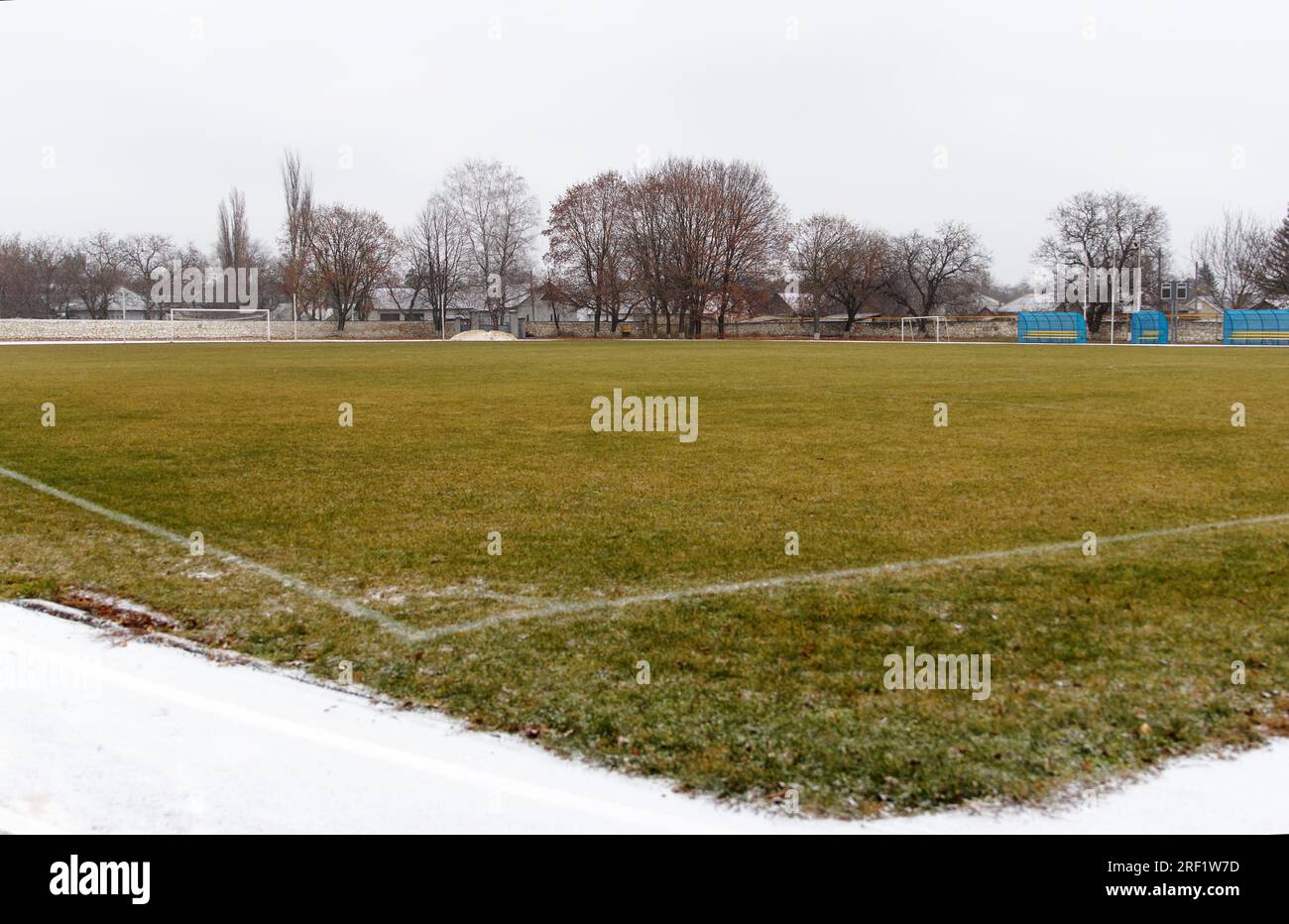 Review of sports stadium. A large football field covered with grass ...