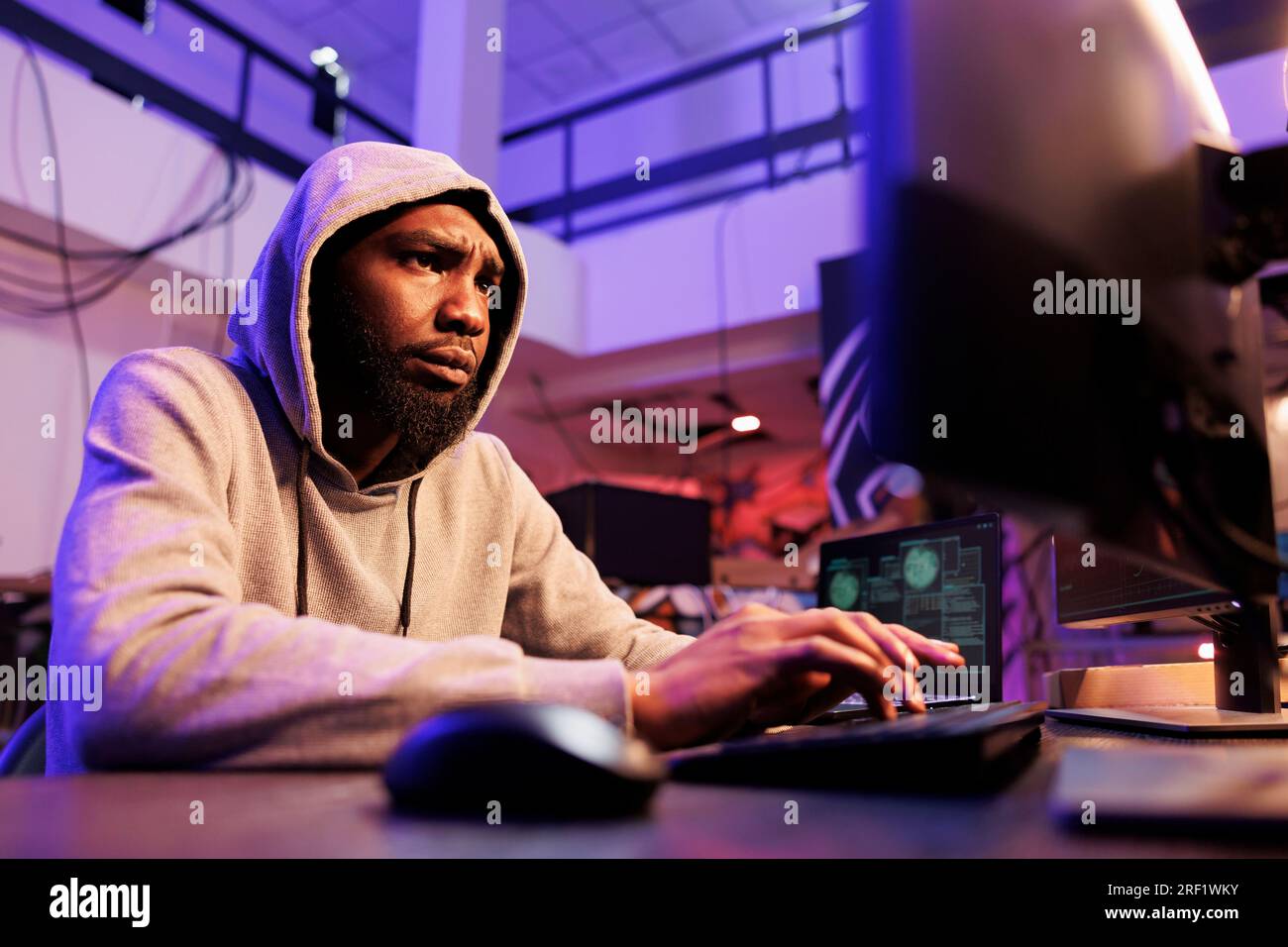 Concerned Hacker Cracking Password And Breaching Into Computer Network