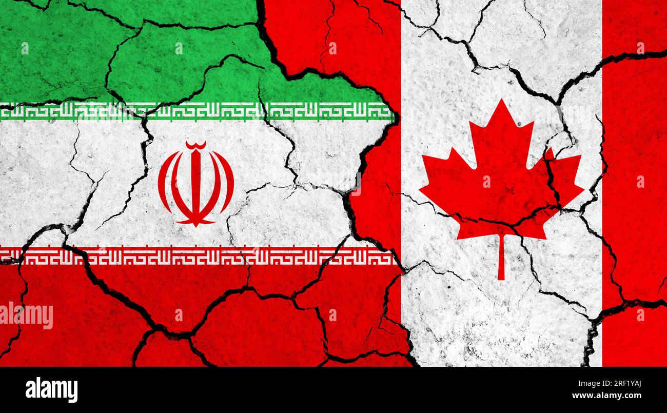 Flags of Iran and Canada on cracked surface - politics, relationship ...