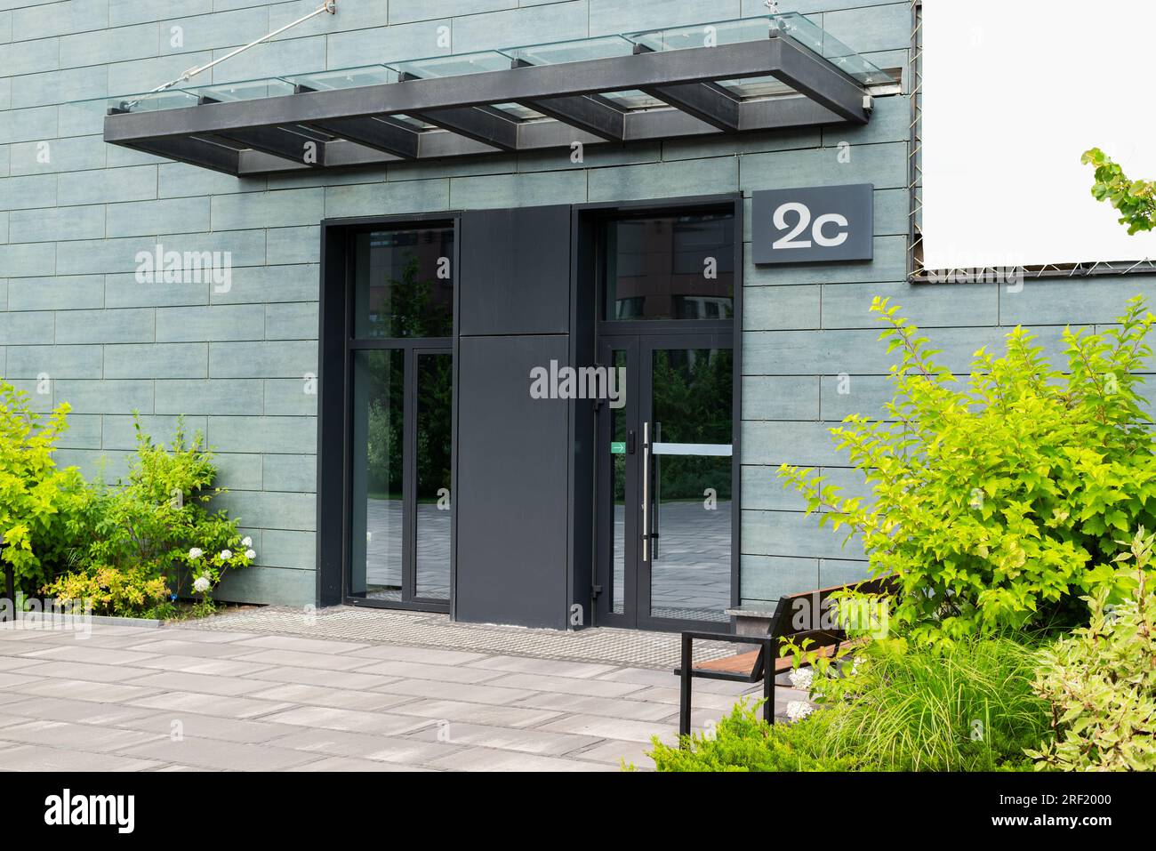 Entrance of the modern business city office building Stock Photo - Alamy