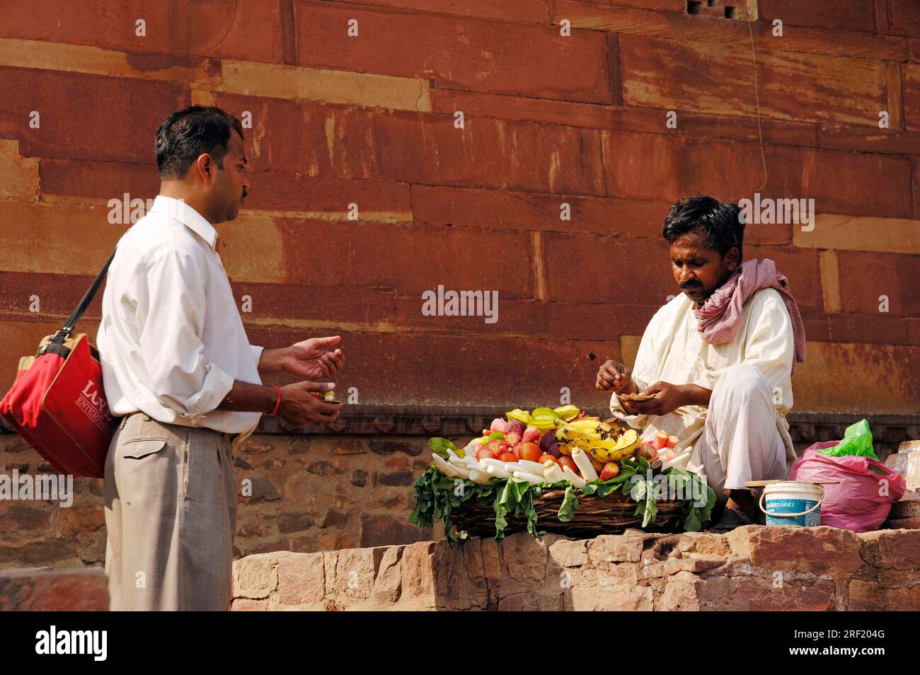 Fruit seller at the Jami Masjid Mosque, Dargah, Mughal town of Fatehpur ...
