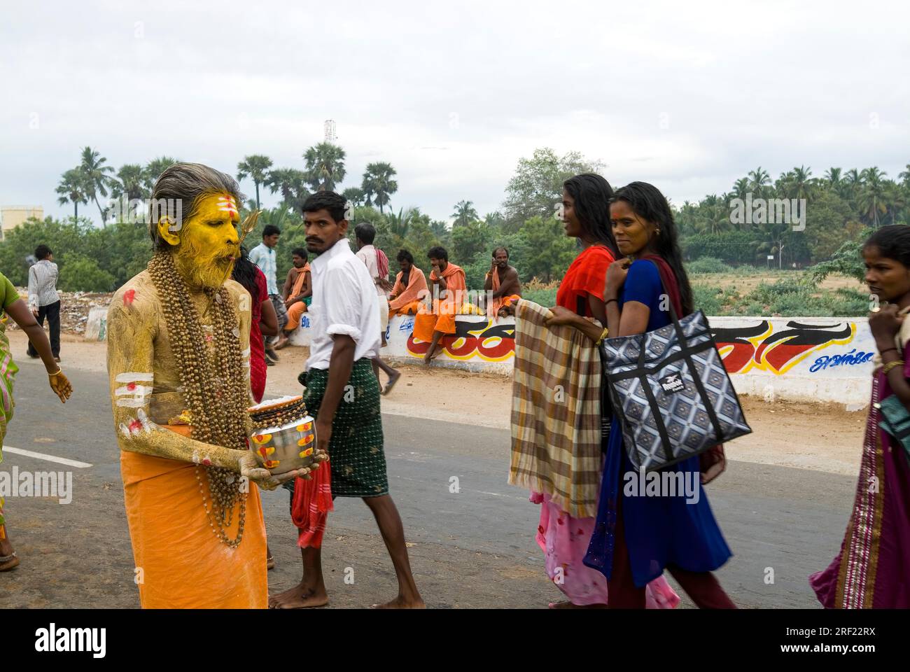 Pilgrim decorated with Sacred Ash and trance trident-like spears ...