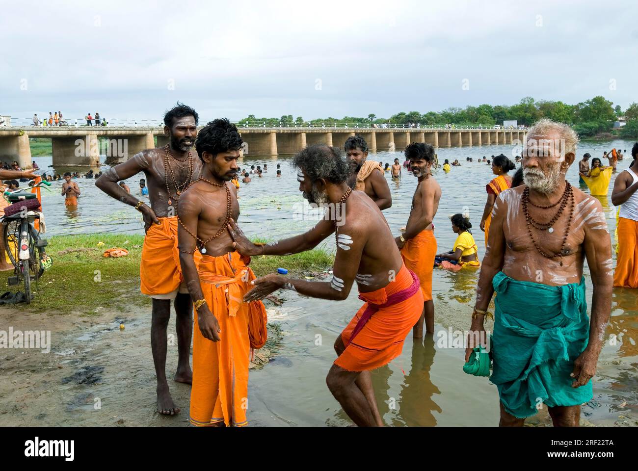 Pilgrims after bathing in the river Thamirabarani and applying Sacred ...