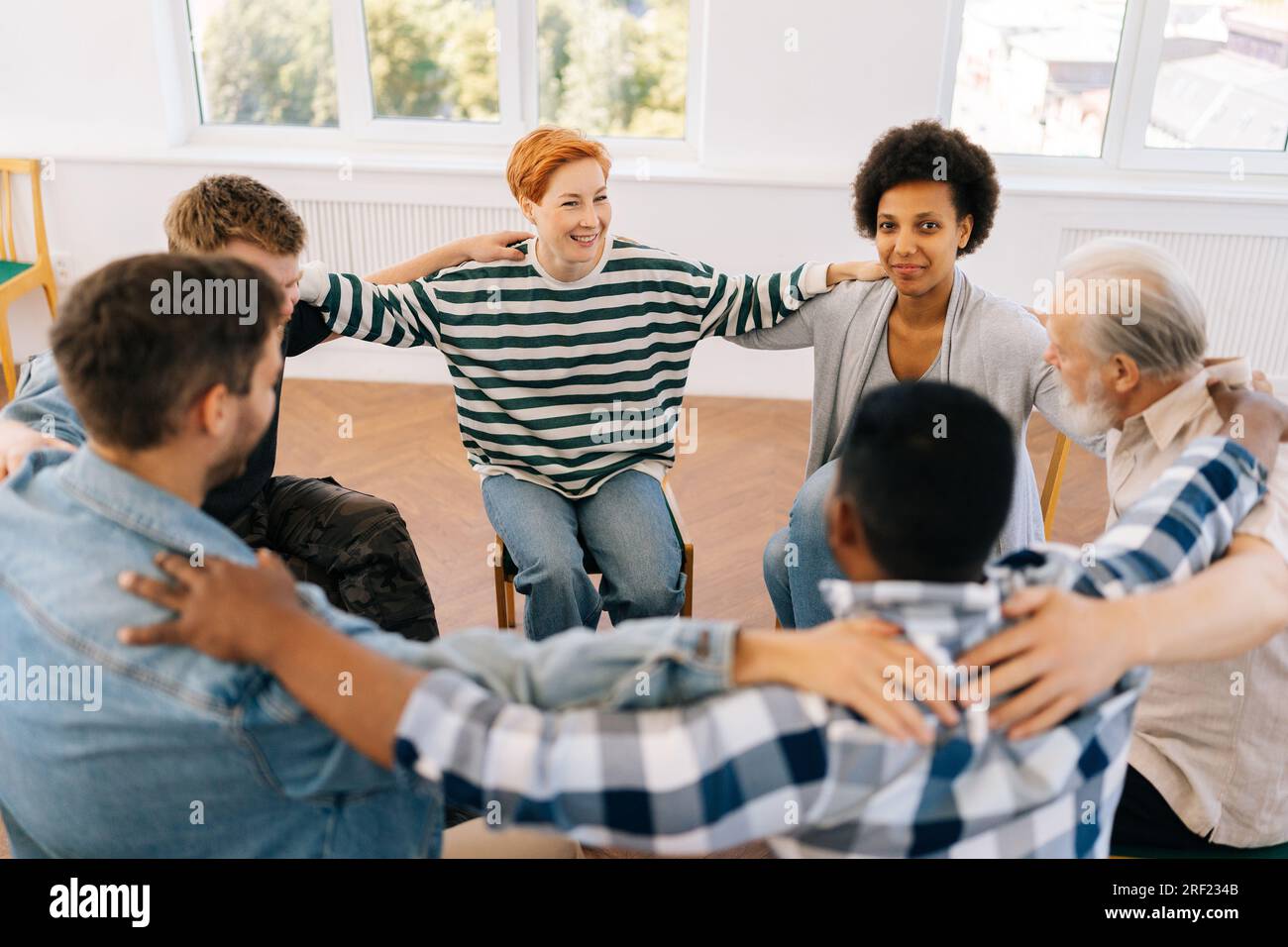 Happy multicultural and different ages group of addicted people discuss ...