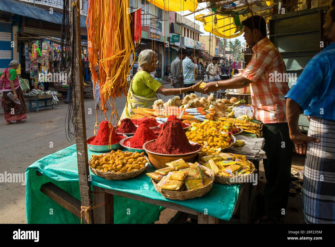 Turmeric kumkum and other pooja puja things in a shop at Swamimalai ...