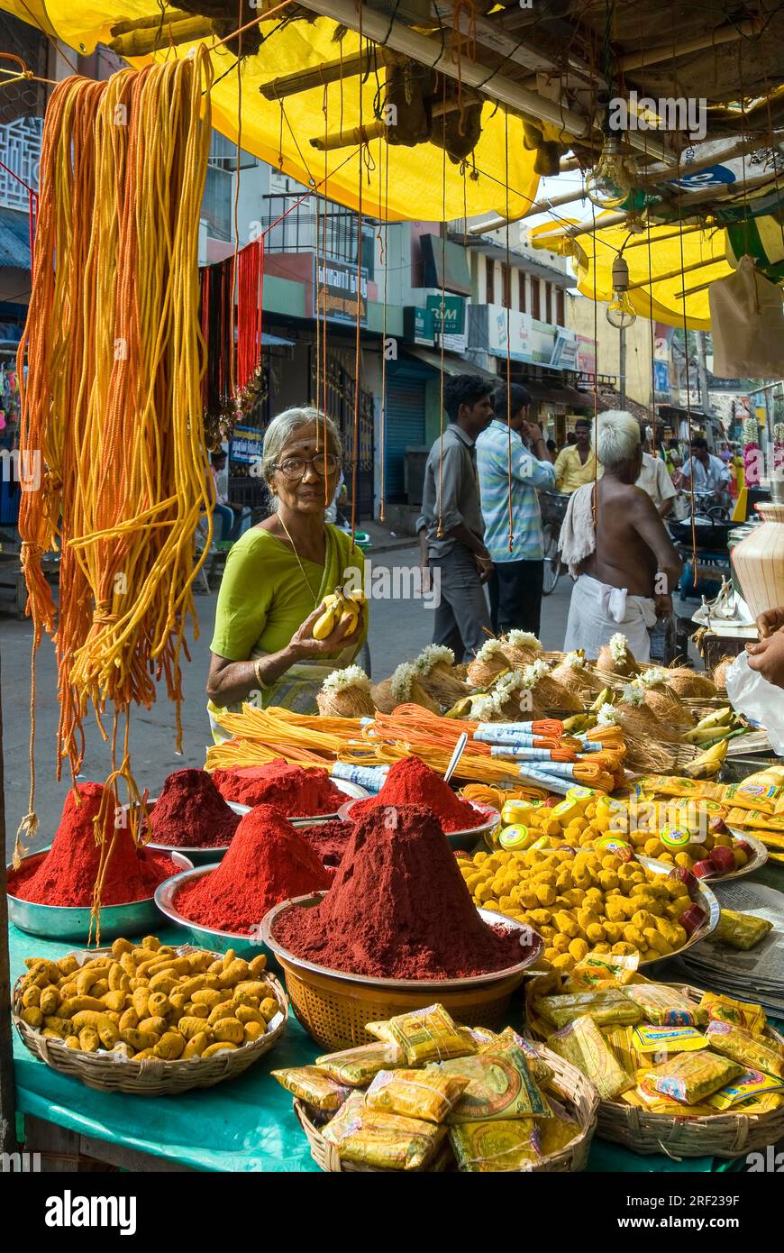 Turmeric kumkum and other pooja puja things in a shop at Swamimalai ...