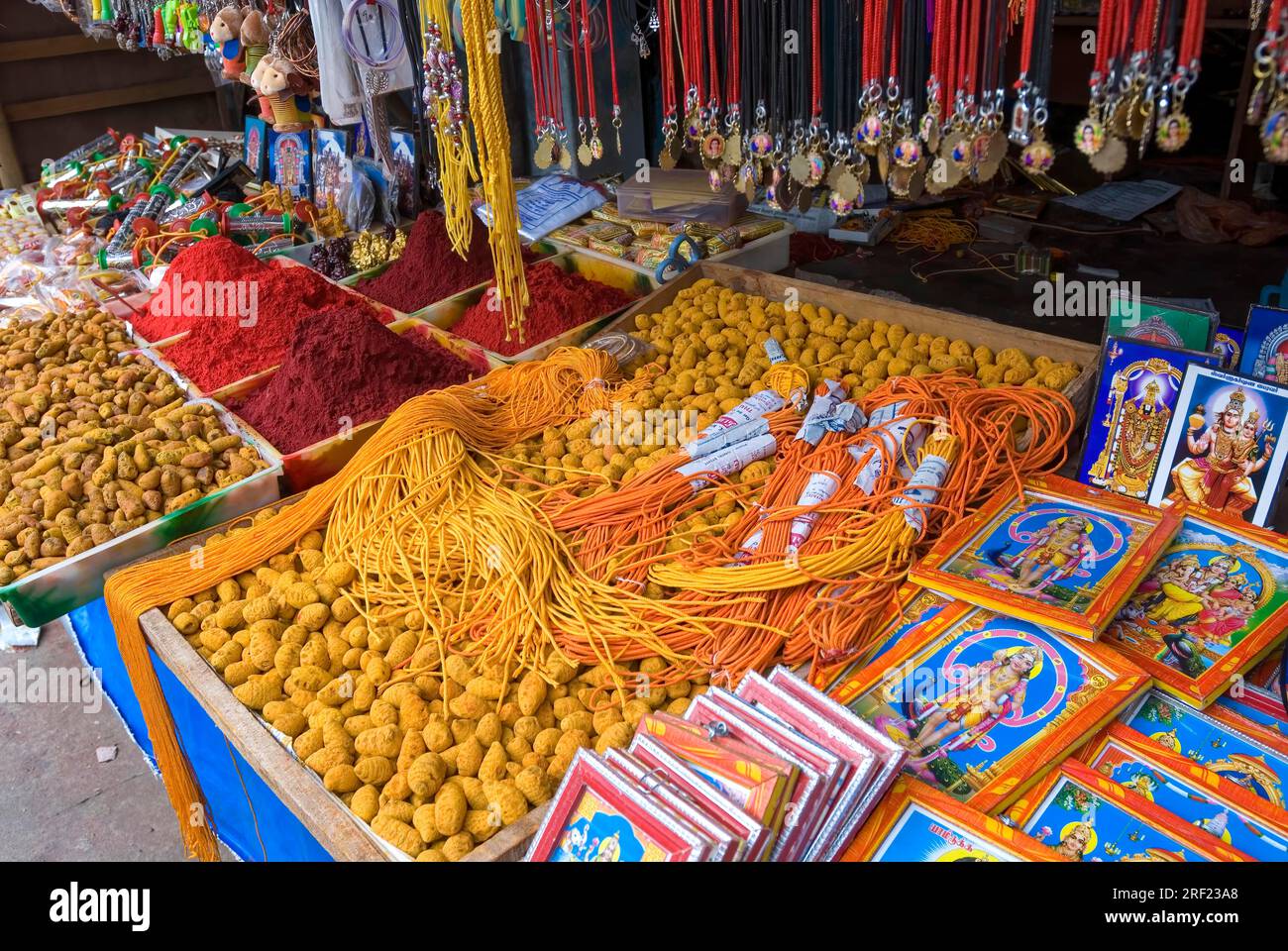 Framed God pictures turmeric kumkum and other pooja puja things in a ...