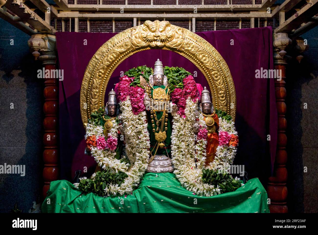 Decorated Urchava deity of Lord Murugan with with consorts Valli and ...