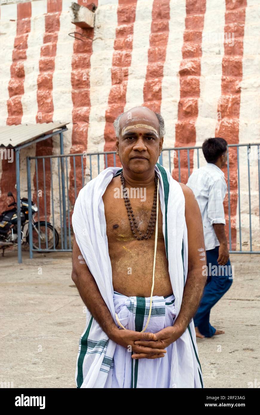A temple priest in Lord Murugan Temple at Thiruttani Tiruttani Tirutani ...