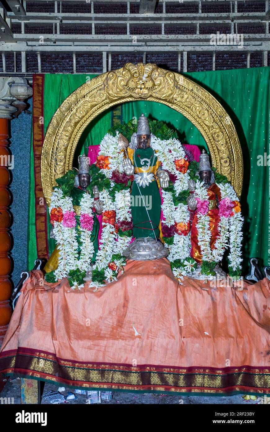 Decorated Urchava deity of Lord Murugan with with consorts Valli and ...