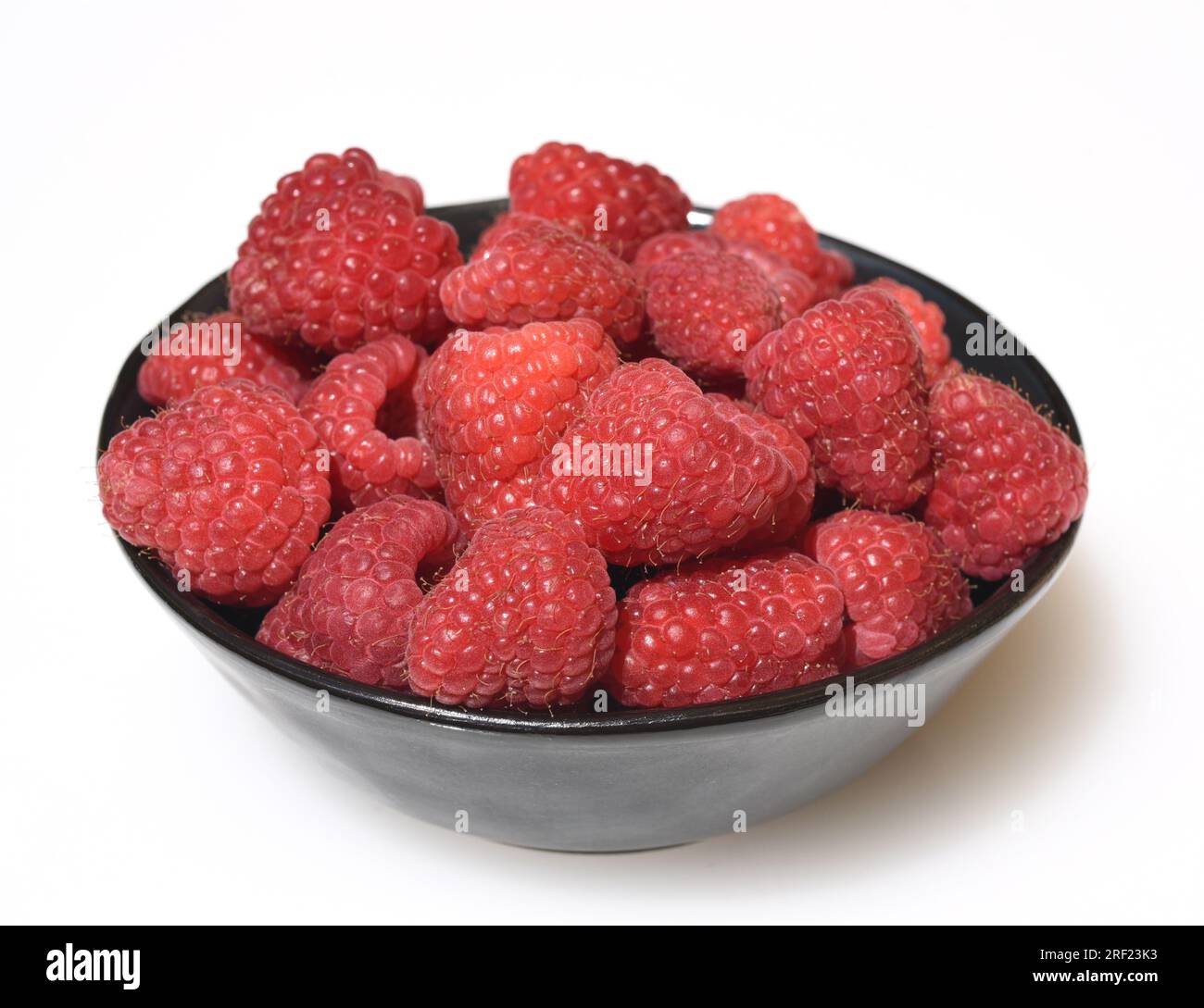 Raspberries, Rubus idaeus, is a tasty berry plant with red berries ...