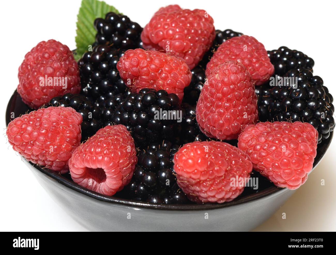 Raspberries, Rubus idaeus, is a tasty berry plant with red berries ...