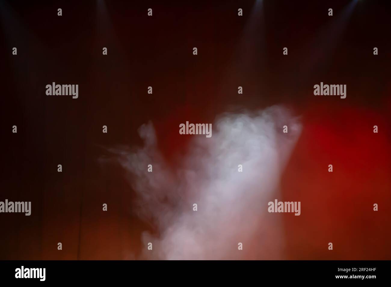 Red blurred background with puffs of white smoke Stock Photo - Alamy