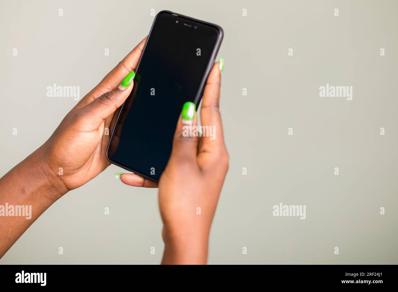 Hands Holding Mobile Phone Gadgets operating blank space screen display ...