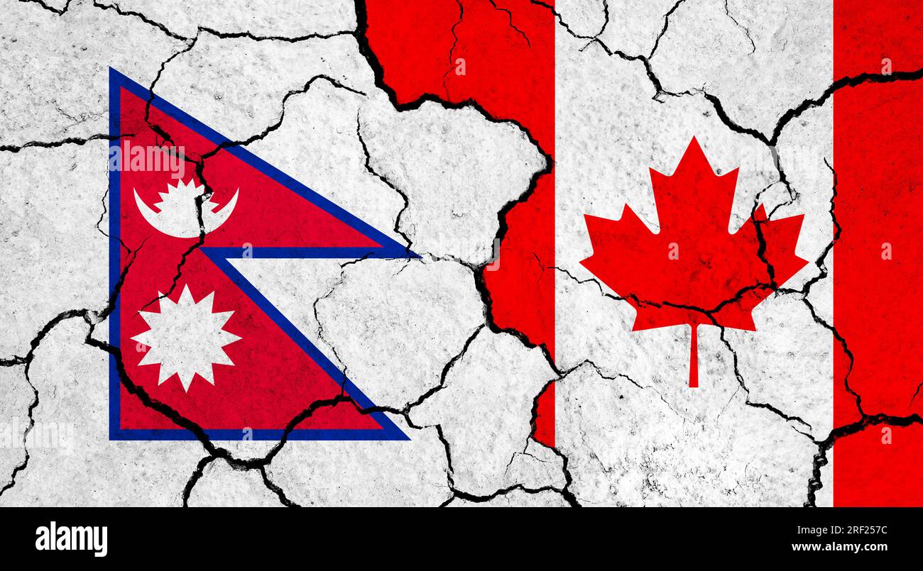 Flags of Nepal and Canada on cracked surface - politics, relationship ...
