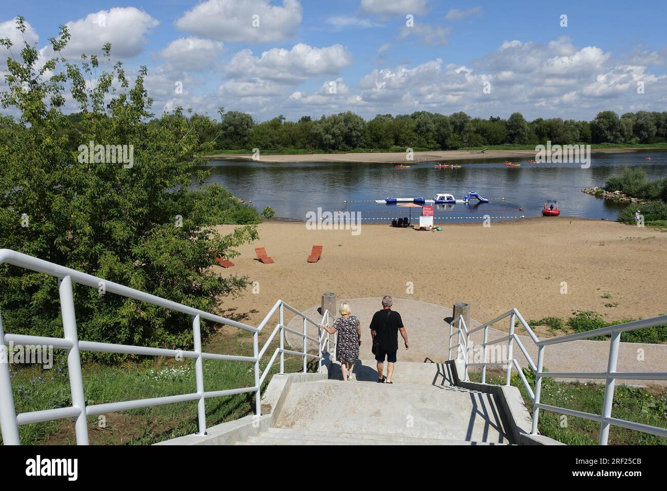 A deserted beach on the banks of the Narew River, Poland, in summer ...