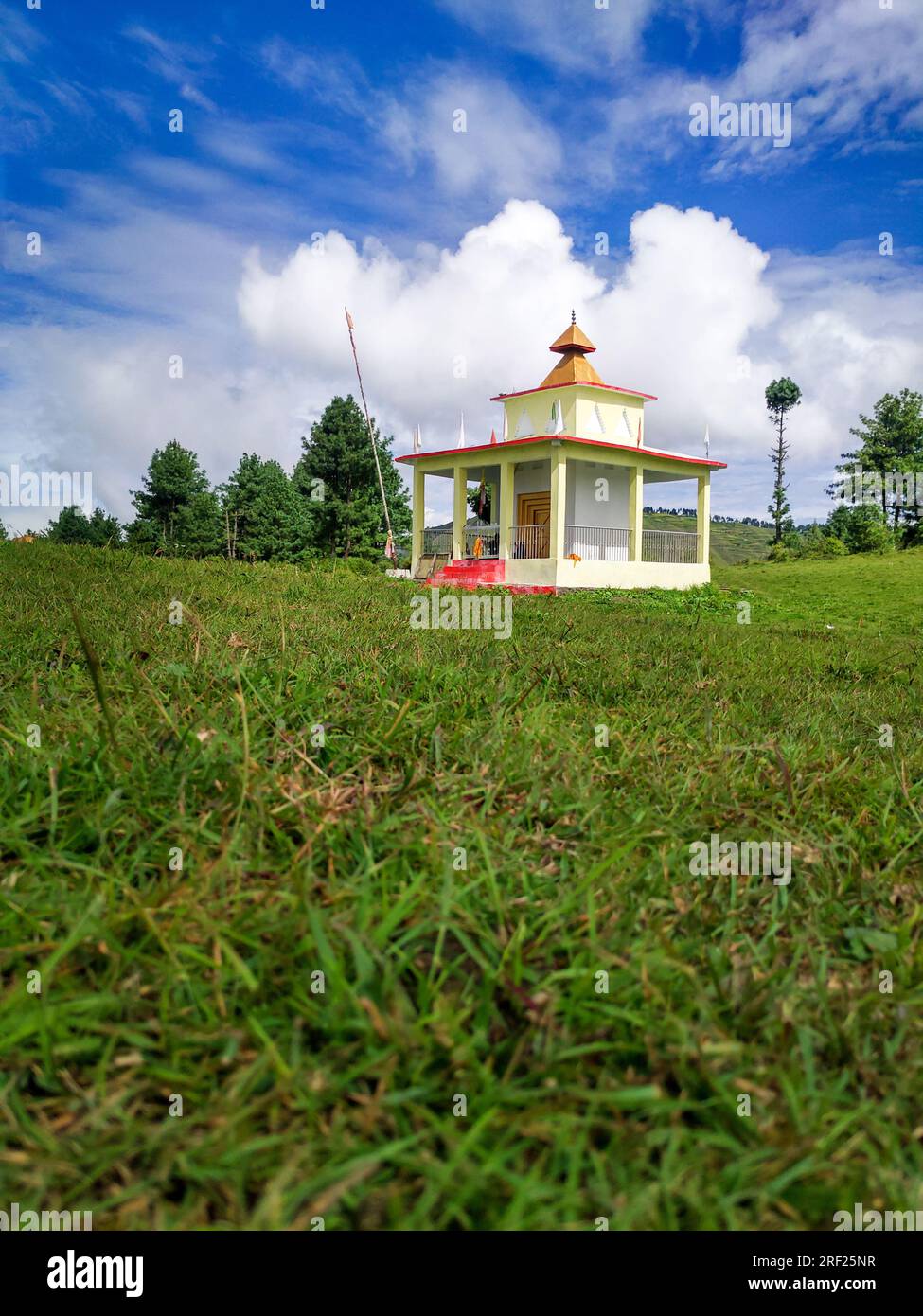 Scenic Hindu temple amidst Himalayan meadow in Uttarakhand, India Stock ...