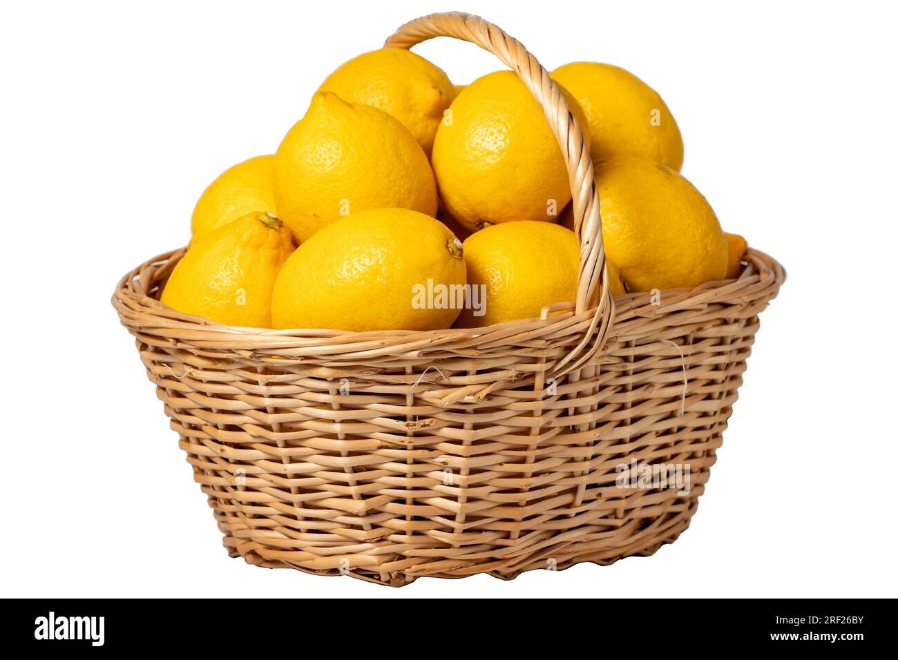 Fresh lemon in a wicker basket isolated on white background. Lemon ...