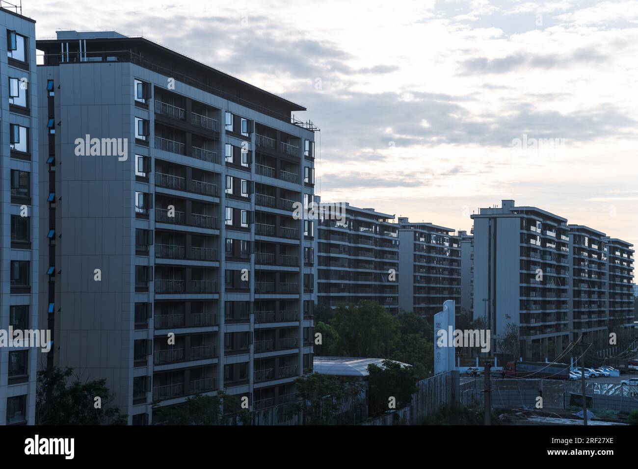 The sunny day sunlight shining on top of the apartment building Stock ...