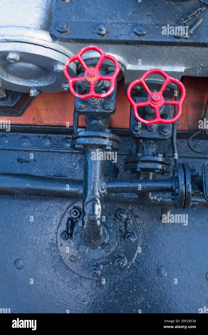 Pipe lines and manual operated valves to control system Stock Photo - Alamy