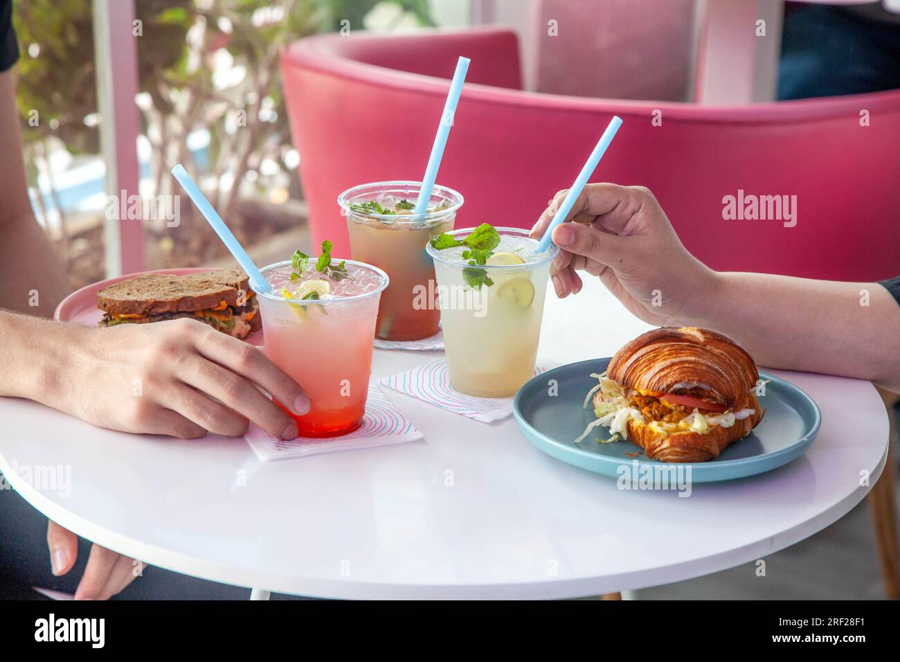 Iced mocktails in a plastic cup in a restaurant environment Stock Photo ...