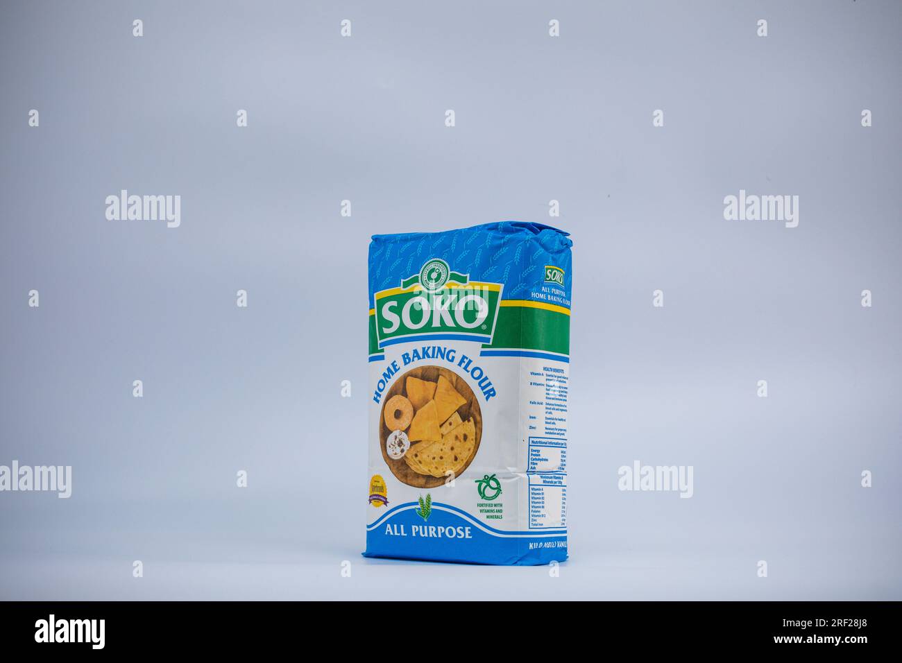 Chapati Mandazi Andazi Samosa triangular-shaped snacks on a plate on a ...