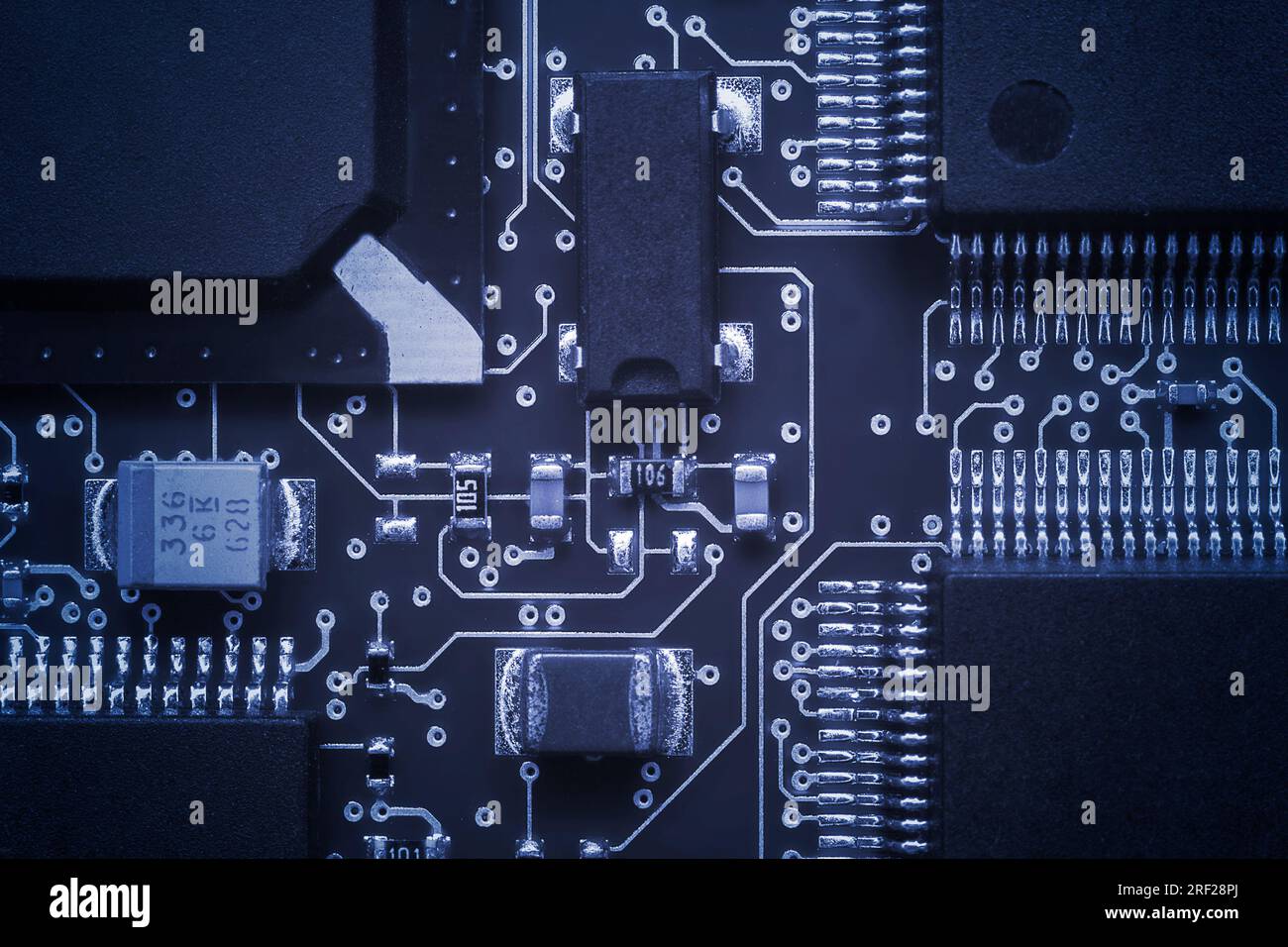 Closeup Of Printed Circuit Board With Processor Integrated Circuits And Many Other Surface