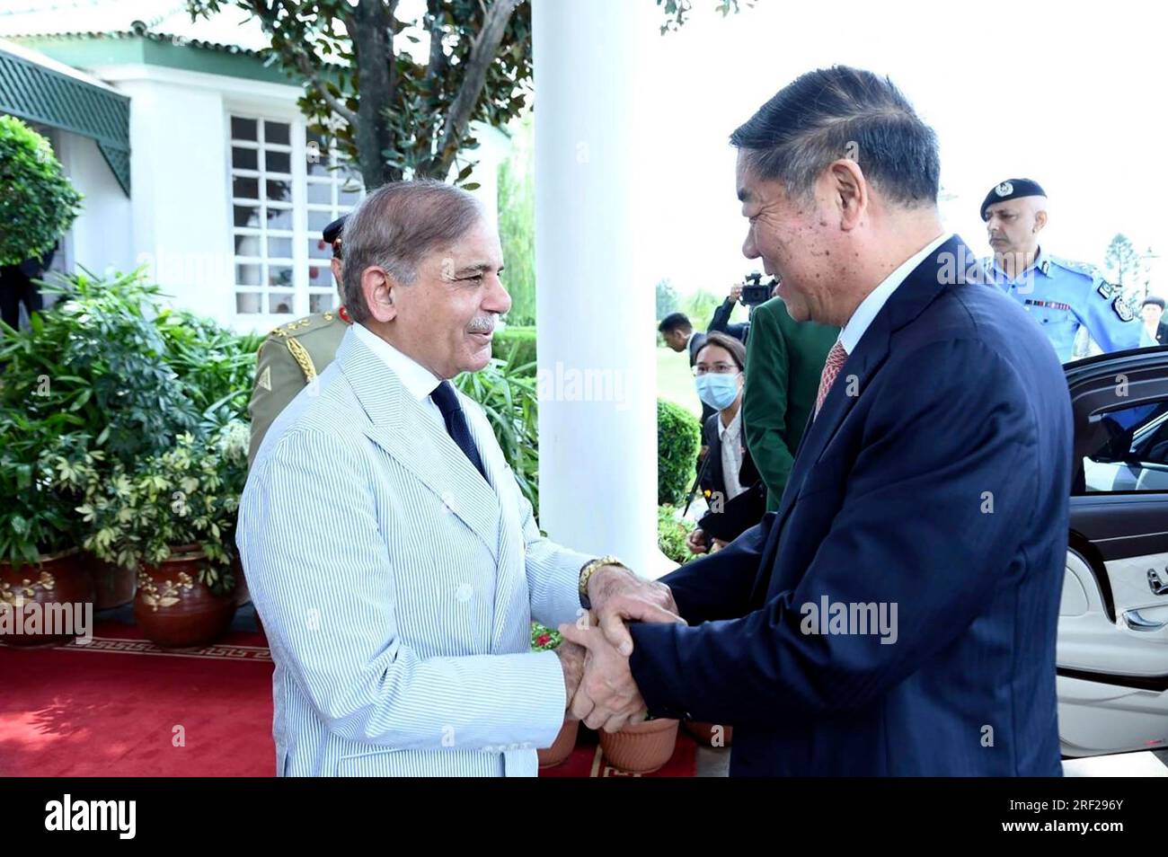 In this handout photo released by Pakistan Prime Minister's Office ...