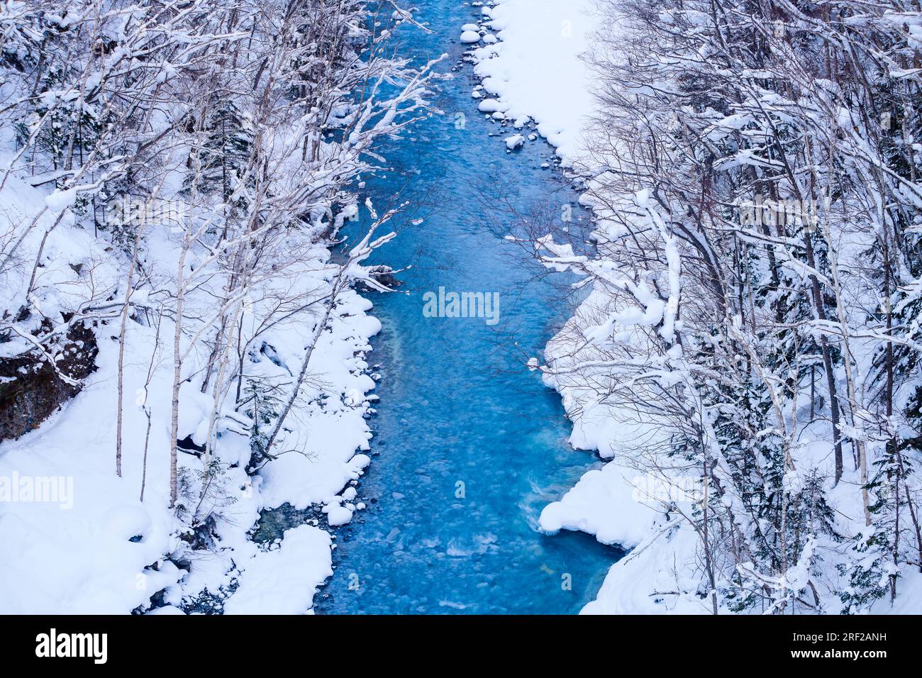 Clear water stream in the snow, Biei, Hokkaido, Japan Stock Photo - Alamy
