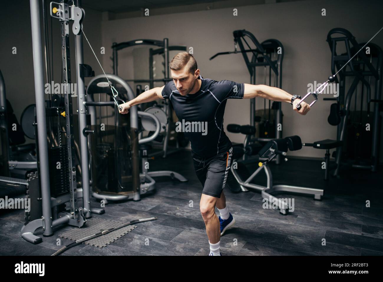 Cross cable training machine hi-res stock photography and images - Alamy