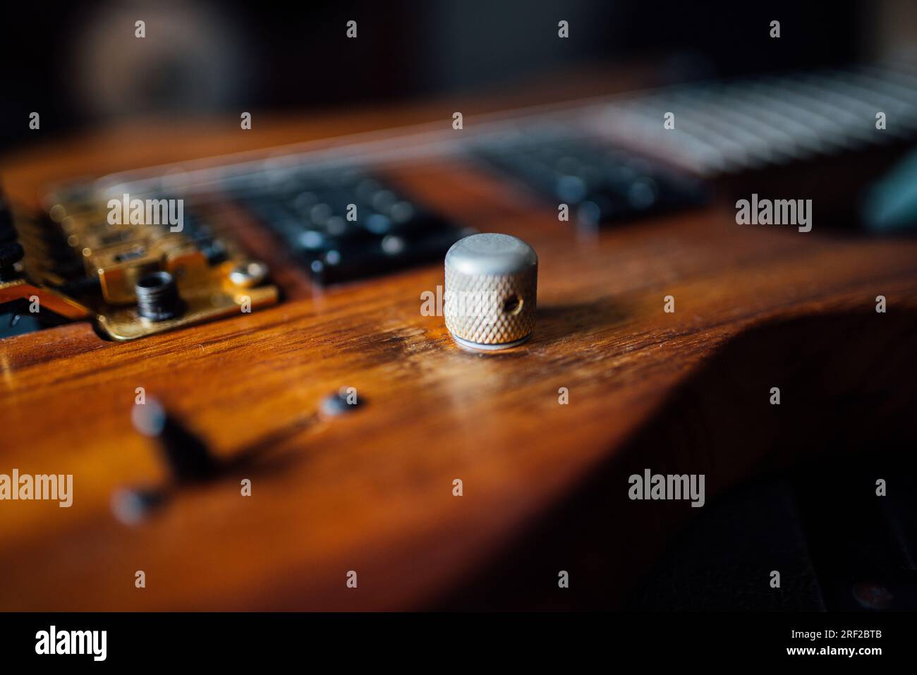 Close up view of electric guitar body with volume control knob Stock ...